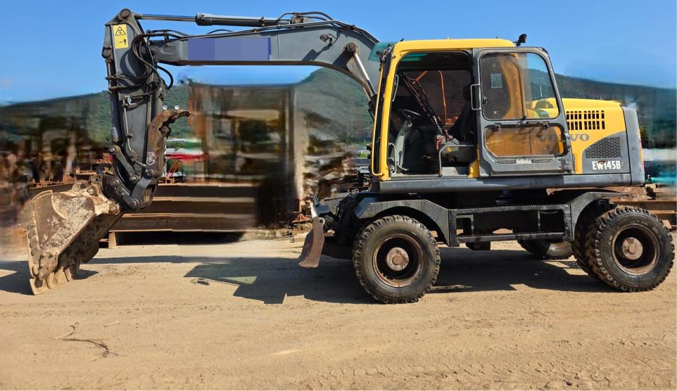 VOLVO WHEEL EXCAVATOR EW145BP(STOCK:FB1585) - Faiz Brothers Co. Ltd.